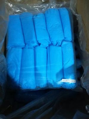Cina La scarpa eliminabile dell'anti piede di plastica di slittamento riguarda lo spessore blu-chiaro di colore 30gsm in vendita