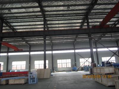 Cina Prefabricated Steel Frame Construction Easy to Assemble Corrugated Metal Building Steel Structure Warehouse in vendita