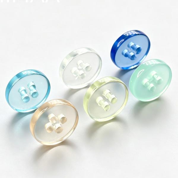 Quality High-strength glass buttons in 10mm-40mm sizes with transparent and colored liquid options for garments and fashion for sale