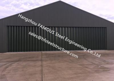 China Stable Triangular Seal Vertical Hinged Door Sectional Leaves Folding Sliding Hangar Doors for sale