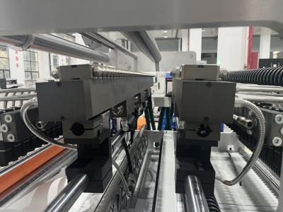 China High Efficient Automatic Foam hot melt adhesive Intermittent Gluing and Wave Receiving Production Line for sale