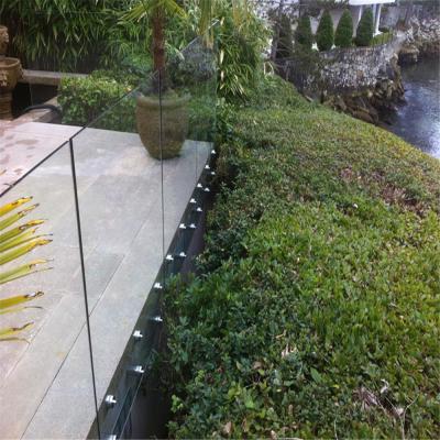 China Porch railing systems with steel standoff glass panel design for sale