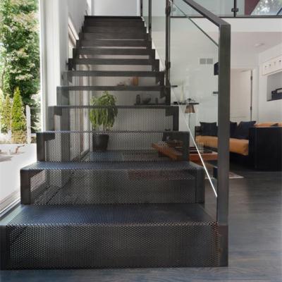 China carbon steel mesh staircase with toughed glass balsutrade design for sale