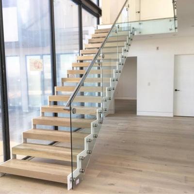 China Modern design steel structure staircase with side mounted glass balustrade for sale