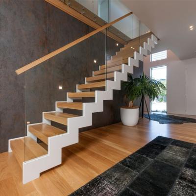 China Fordable lobby staircase in steel stringer glass handrail design for sale