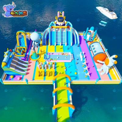 China Colorful Rainbow Inflatable Bouncy Castle Rocket Astronaut Planet Elements UV Resistant for sale