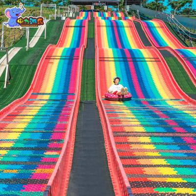 China Outdoor Large Amusement Equipment Slide Outdoor Rainbow Snow Slip Slide for sale