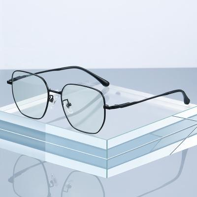 Cina Occhiali con montatura in titanio poligonale con lenti anti luce blu per uomo e donna in vendita