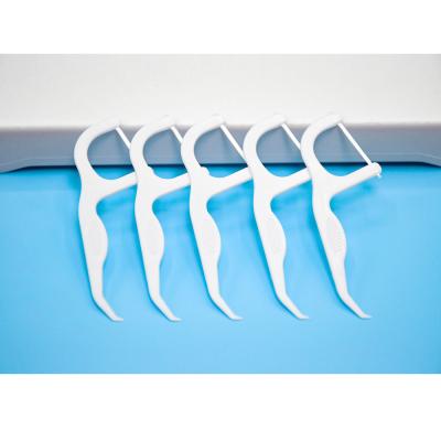 Cina Disposable hotel viaggio uso a domicilio pulizia dentale Dental Floss Zucchero per denti Pulizia dentale Floss Sticks in vendita