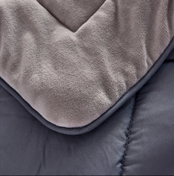 Detail of comforter stitching and construction