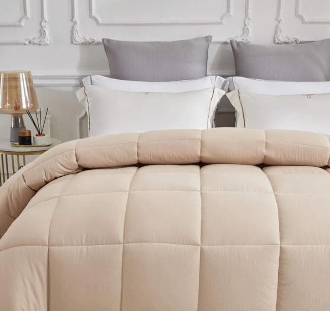 Beige stitched microfiber comforter set showing box quilted design