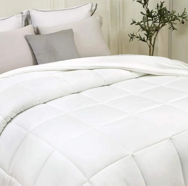 White microfiber comforter with box quilting pattern