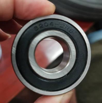 Cina Cuscinetti a rulli 6204 del trasportatore della sfera d'acciaio per la ruota 20*47*14 del pattino in vendita