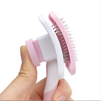 Cina Spazzola rosa Cat Hair Removal Comb automatica governare dell'animale domestico di auto pulizia del cane in vendita