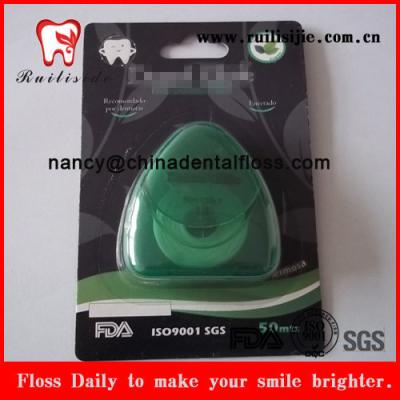 China Colorful 50M triangle shape dental floss rolls with customized logo for sale