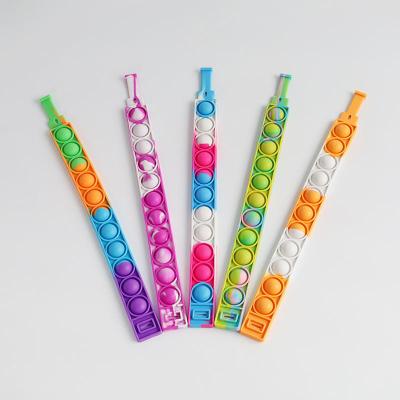 China Silicone Rubber Bubble Stress Relieving Toy Rainbow Rubber Customized Popular Bracelet for sale