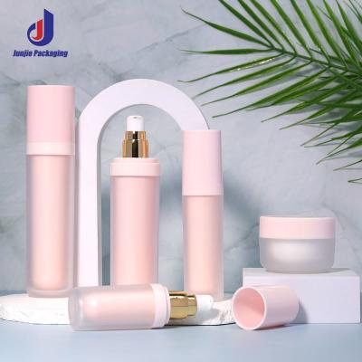 China 30g 50g Cream Double Walled Cosmetic Jar and Pink Lotion Spray Bottle Set Luxury Acrylic Packaging with Screen Printing for sale