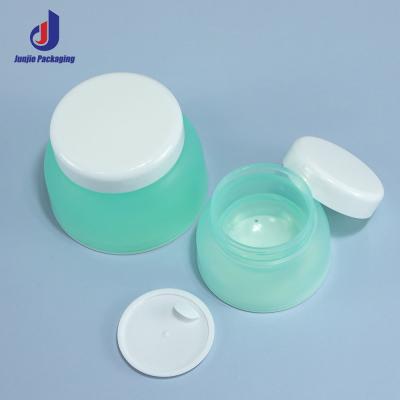 Cina Prodotti cosmetici industriali Lozione Crema Matte Finish Vaso con coperchio Verde traslucido Luxury vuoto 50G Contenitori cosmetici in vendita