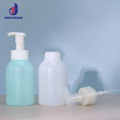 China 30ml Plastic Cosmetic Bottles Empty Essential Oil Bottle Luxury With Bamboo Cap And PE Collar Box for sale