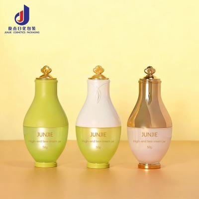 China 50g Custom Acrylic Plastic Jar Face Cream Skin Care Container Packaging Jars With Lids for sale
