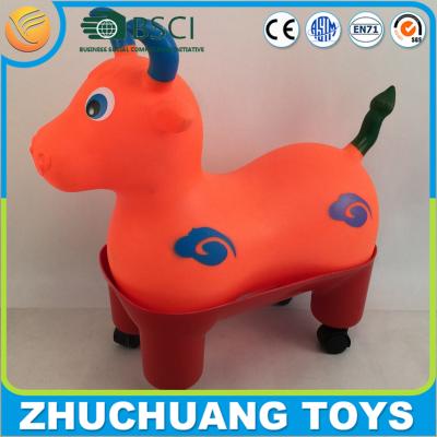 China pvc inflatable animal toy cow on wheels for sale