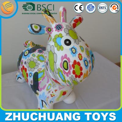 China pvc allover color print jump cartoon inflatable milk cow for sale