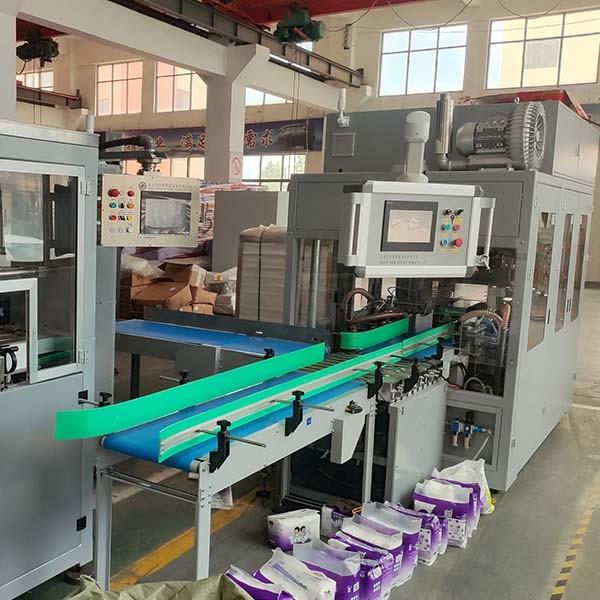 Quality SS Adult Diaper Packing Machine 70 Bags/Min Sanitary Napkin Sealing Machine for sale