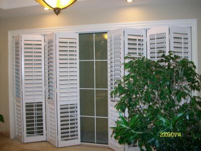 China Basswood Plantation Shutter Bi-folding Panels White Color Silding Door Shutter for sale