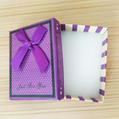 China Design Series Cotton Filled Jewelry Box Shimmer Bow Tie Jewelry Boxes Custom Paper Gift Box for sale