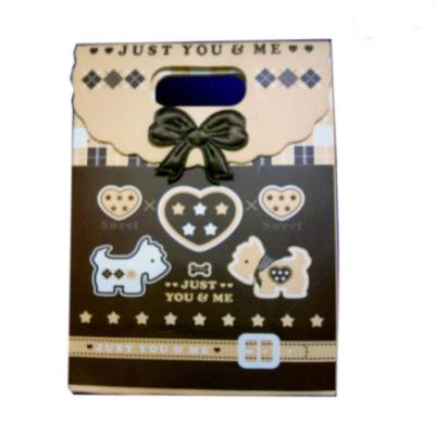 China Customized Durable Wedding Faavor Candy Gift Paper Bag with Stick Handle and Bow for sale