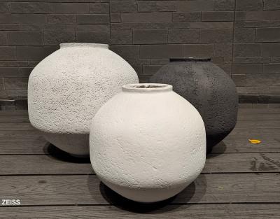 China Optimice el crecimiento de las plantas con macetas de fibra de arcilla personalizadas y orificios de drenaje en venta