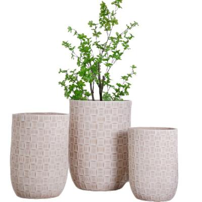 Cina piantatore di argilla di fibra rotonda beige neutrale con tessuto a griglia tessuto leggero durevole a bassa manutenzione vaso da fiore vacanza villa hotel centro commerciale decorazione ufficio giardino progetto di paesaggio in vendita