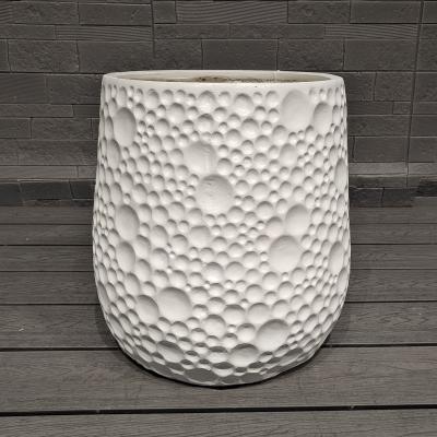 China Pebble  Shaped Protrusion Pattern White Clean Cylindrical Shape Fiber Clay Planter for sale