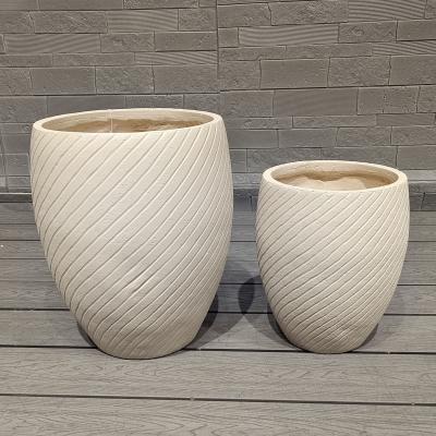 China neutral beige cylindrical shape fiber clay planter with an evenly - spaced ridges pattern  lightweight durable low-maintainence flower pot holiday Villa office decoration garden landscaping project for sale