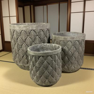 GRC pot grey round fiber cement planter with a repetitive palm leaf pattern lightweight durable low-maintainence flower pot holiday Villa office decoration Rooftop Gardens landscaping project