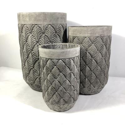 China GRC Pot Grey Cylindrical Repetitive Palm Leaf Pattern Low-maintainence Office Decoration for sale