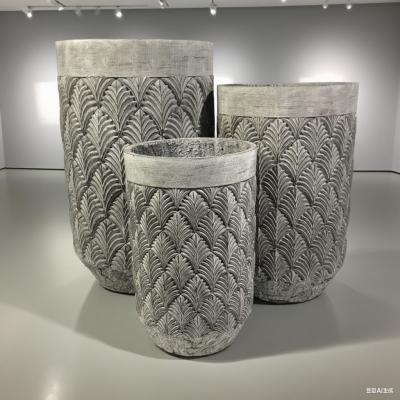 China GRC Pot Grey Cylindrical Repetitive Palm Leaf Pattern Low-maintainence Office Decoration for sale