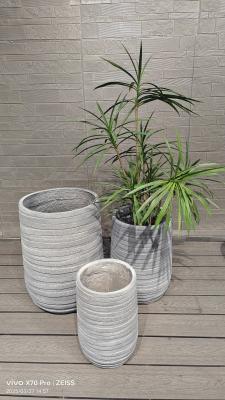 China Light Grey With Horizontal Circular Ridges Round Fiber Clay Planter For Indoor Decoration for sale