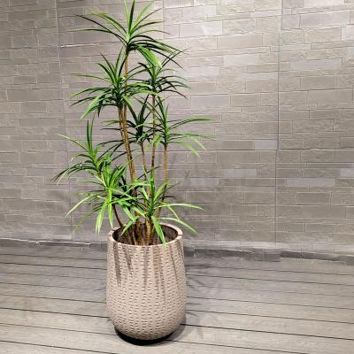 China Light Grayish White Repetitive Geometric Pattern Round Fiber Clay Planter Architectural Landscaping Design for sale