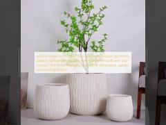 neutral beige round fiber clay planter withradial geometric pattern lightweight durable low-maintainence flower pot holiday Villa hotel shopping mall office decoration garden landscaping project