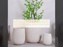 neutral beige round fiber clay planter with vertical ribbed pattern lightweight durable low-maintainence flower pot holiday Villa hotel shopping mall office decoration garden landscaping project