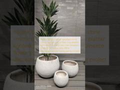 neutral beige natural speckled stone -mimic design round fiber clay planter lightweight durable low-maintainence flower pot holiday Villa office decoration garden landscaping project