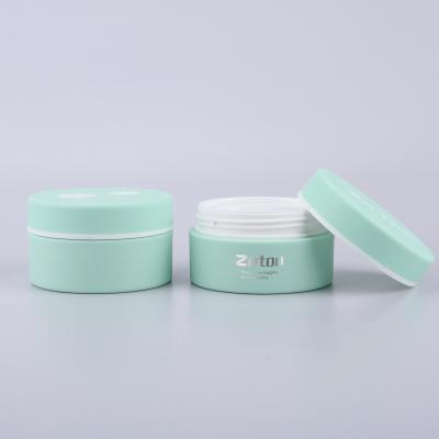 China Two Color Empty Plastic Cosmetic Jars 50ml Eye Cream Jar With Customized LOGO Cap for sale