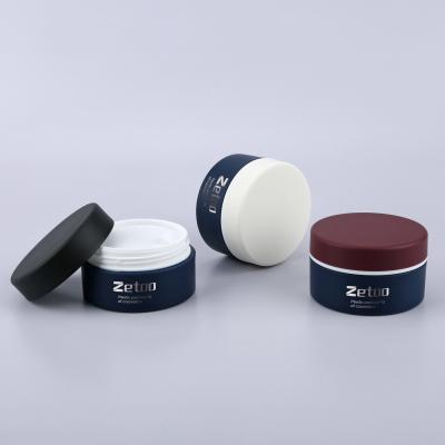 China Soft Touch Cosmetic Cream Container Two Color Custom Plastic Jar 50ml With Matt Cap for sale