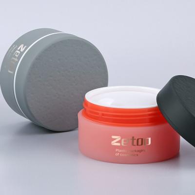 China 50ml Customized Cosmetic Jar Soft Touch Plastic Cosmetic Cream Jar Two Color With Stone Texture Cap for sale