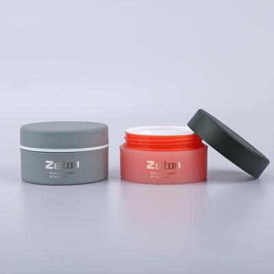 China 50ml Customized Cosmetic Jar Soft Touch Plastic Cosmetic Cream Jar Two Color With Stone Texture Cap for sale