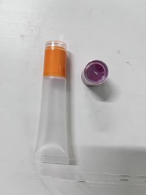 China Transparent Lipstick Tube Packaging Silicone Head Plastic Lip Balm Container With Two Color Caps for sale