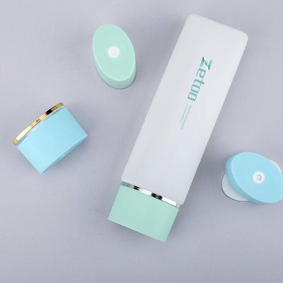 China Oval Plastic Cosmetic Bottle PE Custom Cosmetic Bottles With Center Dispensing Cap for sale