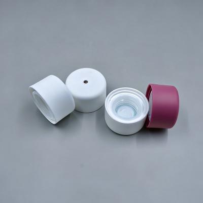 China TPE Soft Touch 45mm Diameter Matt Center Dispensing Cap Cosmetic Shampoo Twist Cap for sale