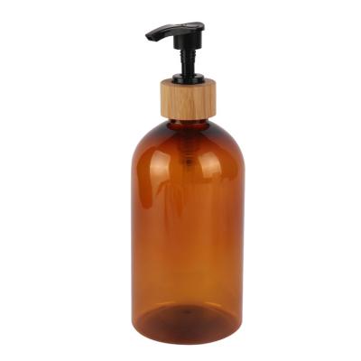 Cina 200 ml 300 ml 500 ml Bottiglia ricaricabile di lozione Amber con pompa di lozione di bambù naturale in vendita